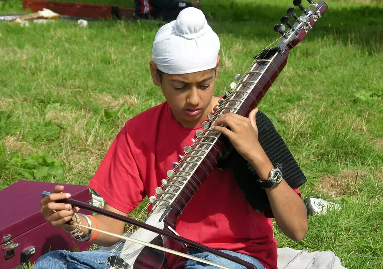 The Esraj is an Indian musical string instrument, a cross between the sitar (another Indian musical instrument) and the cello. A bow is used to play it.