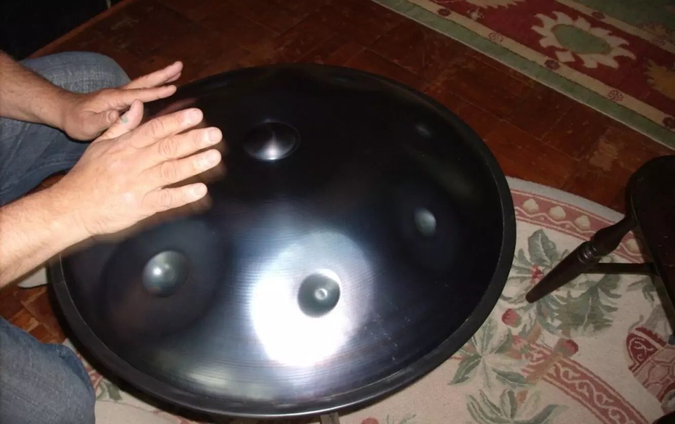 Hang is a percussion instrument, vaguely reminiscent of a UFO. It consists of two metal hemispheres and was developed in 2000 in Switzerland. Sounds can be produced from it with the fingertips, thumbs, or the base of the hand.