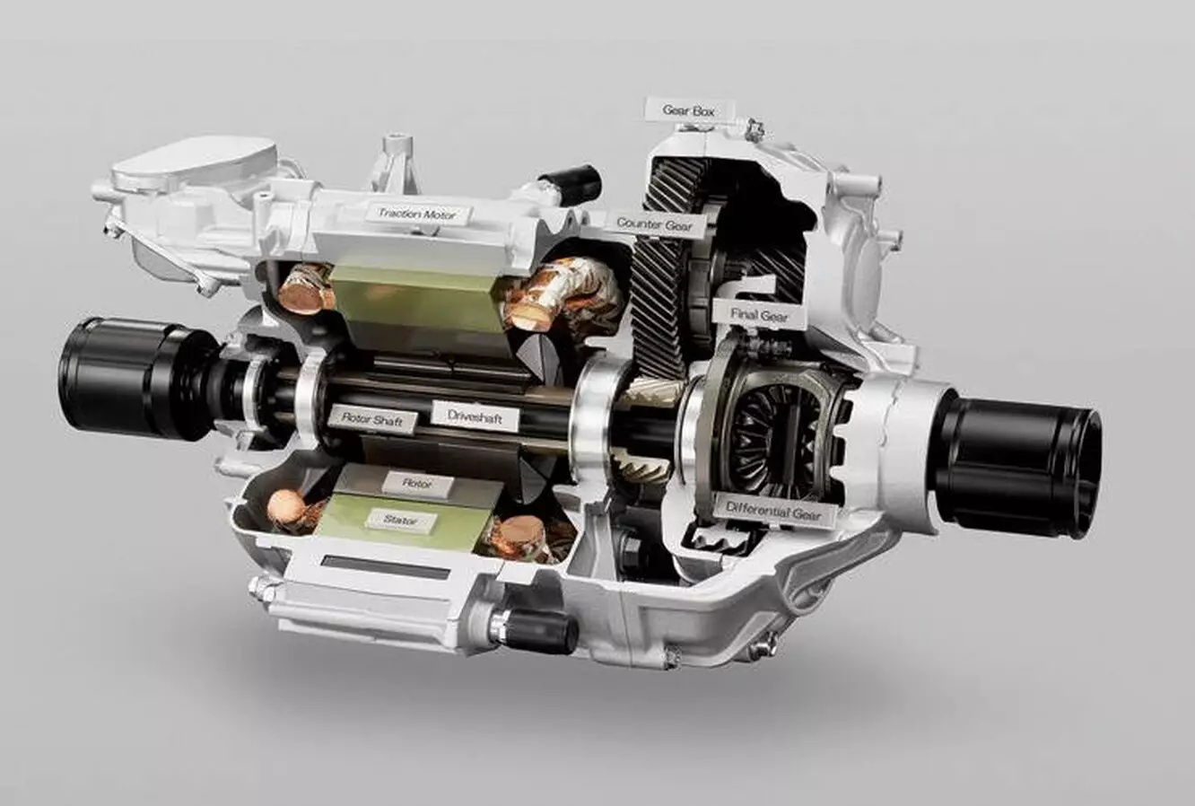 Elektrischer Antriebsstrang FCX Clarity Koaxiales Layout. Durch die Positionierung der Hauptgetriebewelle in einem hohlen Permanentmagnetrotor konnten die Honda-Ingenieure Motor, Getriebe und Kühlsystem in einem einzigen Paket unterbringen.