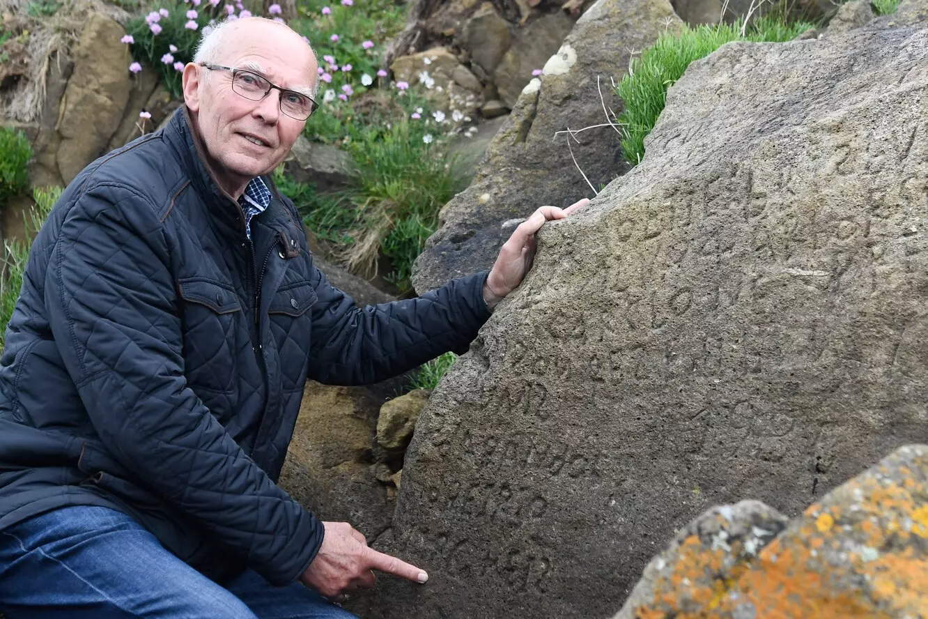 A cash prize has been announced for deciphering an ancient inscription on a stone